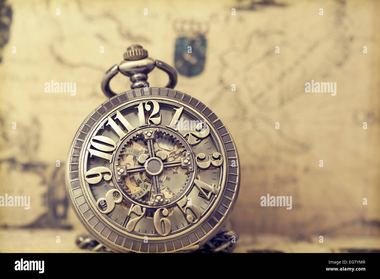 Vintage watch on antique map. Retro still life Stock Photo - Alamy