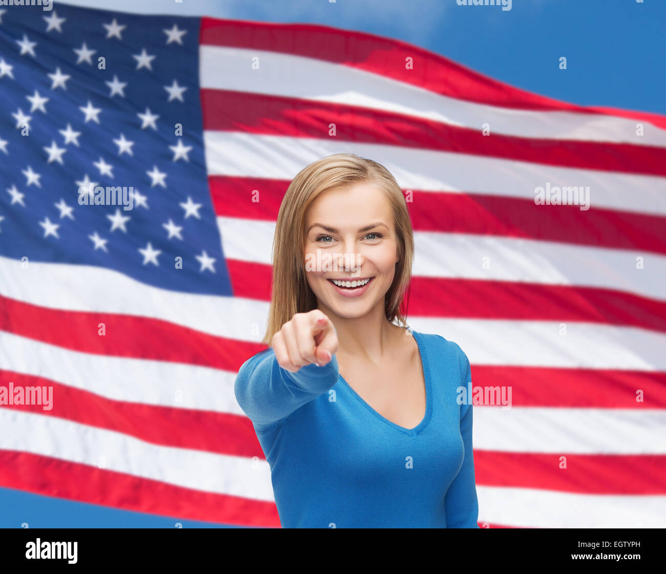 smiling student pointing finger at you Stock Photo - Alamy
