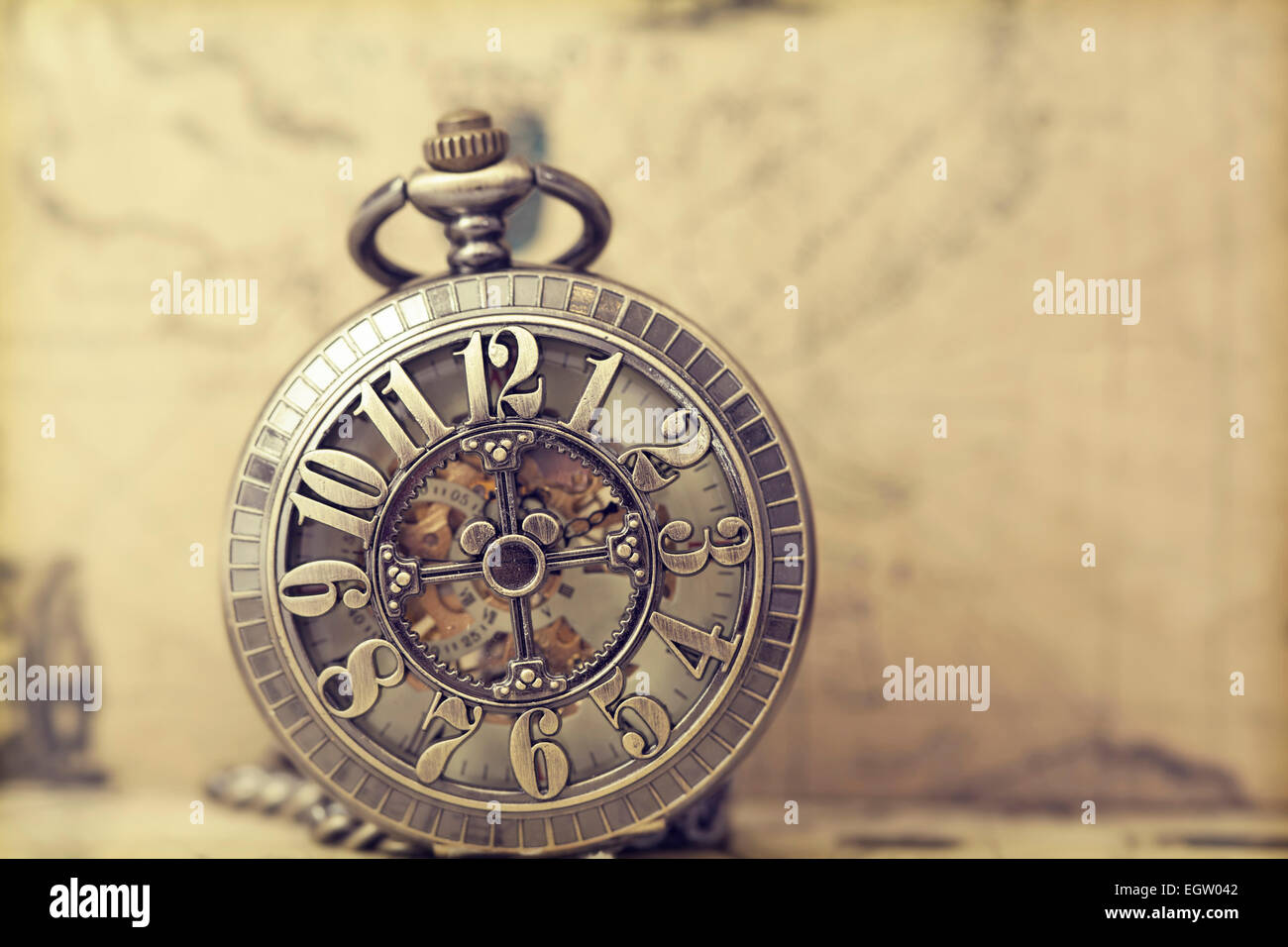 Vintage watch on antique map. Retro still life Stock Photo - Alamy