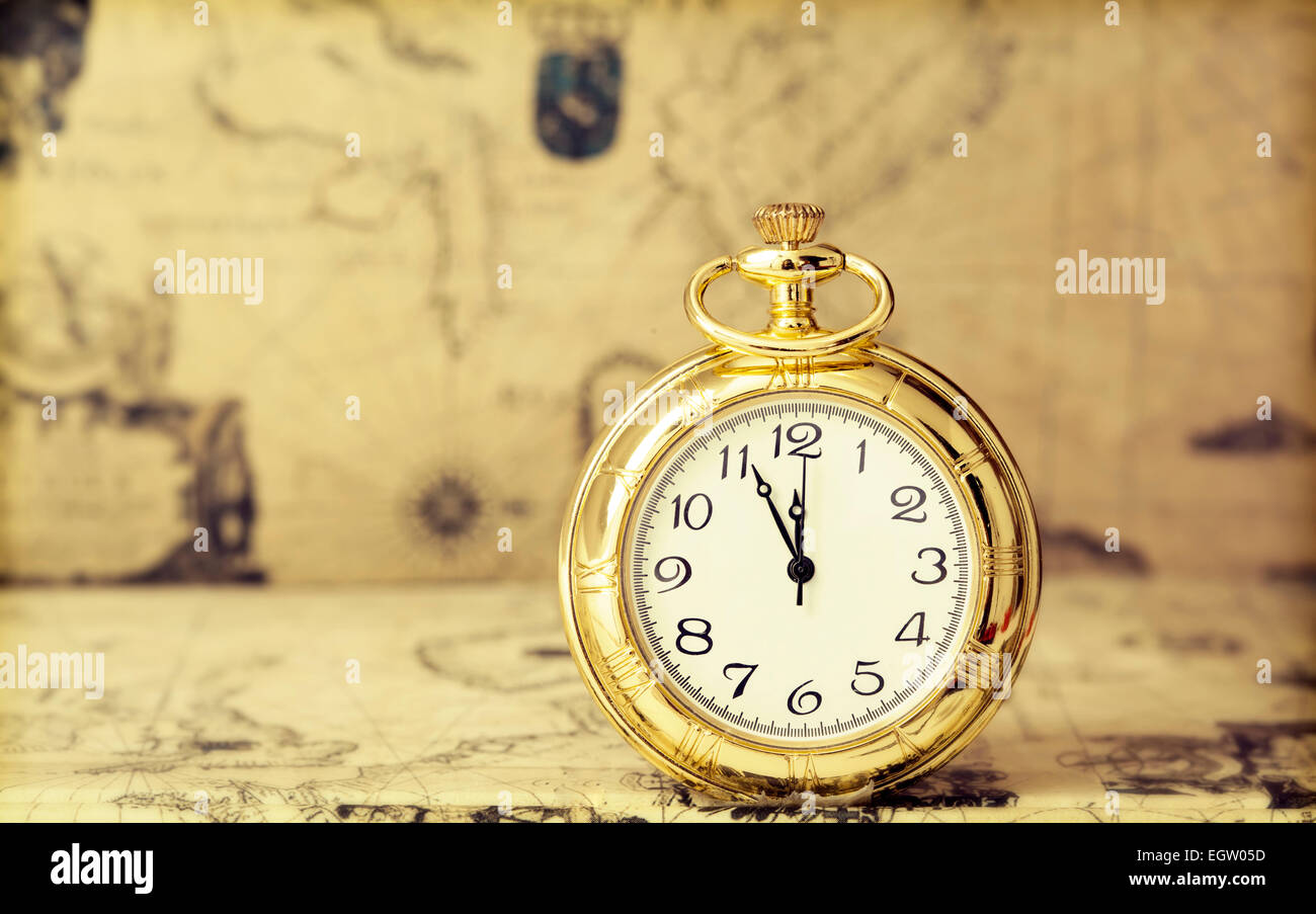 Vintage watch on antique map. Retro still life Stock Photo - Alamy