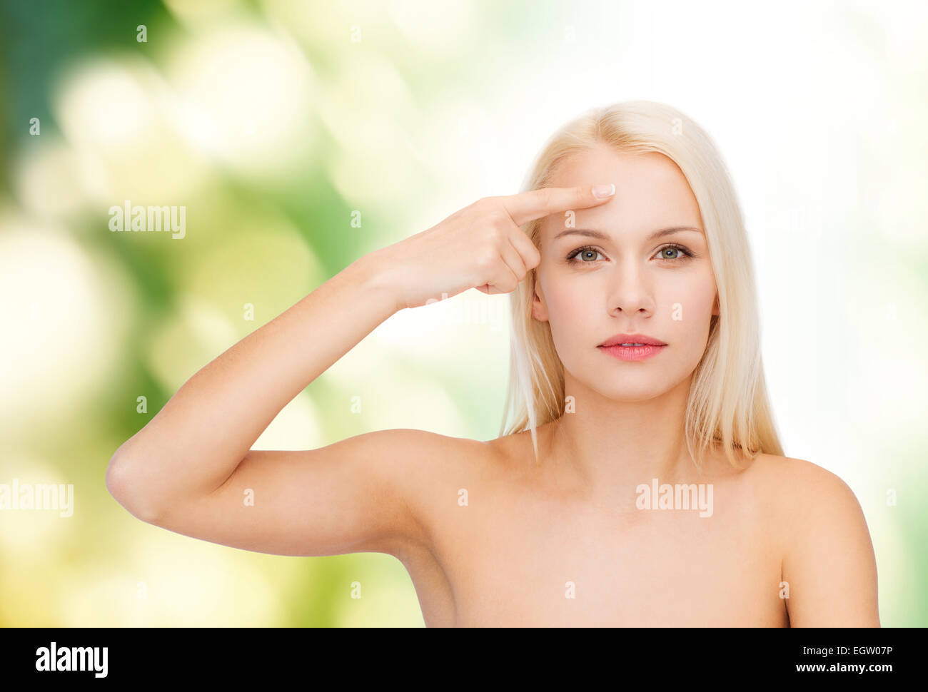 beautiful woman touching her forehead Stock Photo - Alamy beautiful woman touching her forehead Stock Photo - Alamy