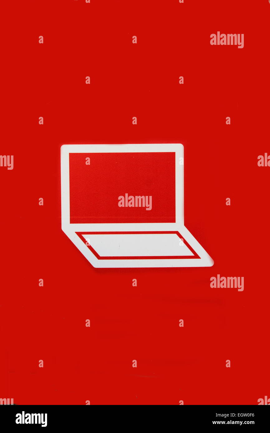 ion a red background shows the icon laptop Stock Photo - Alamy