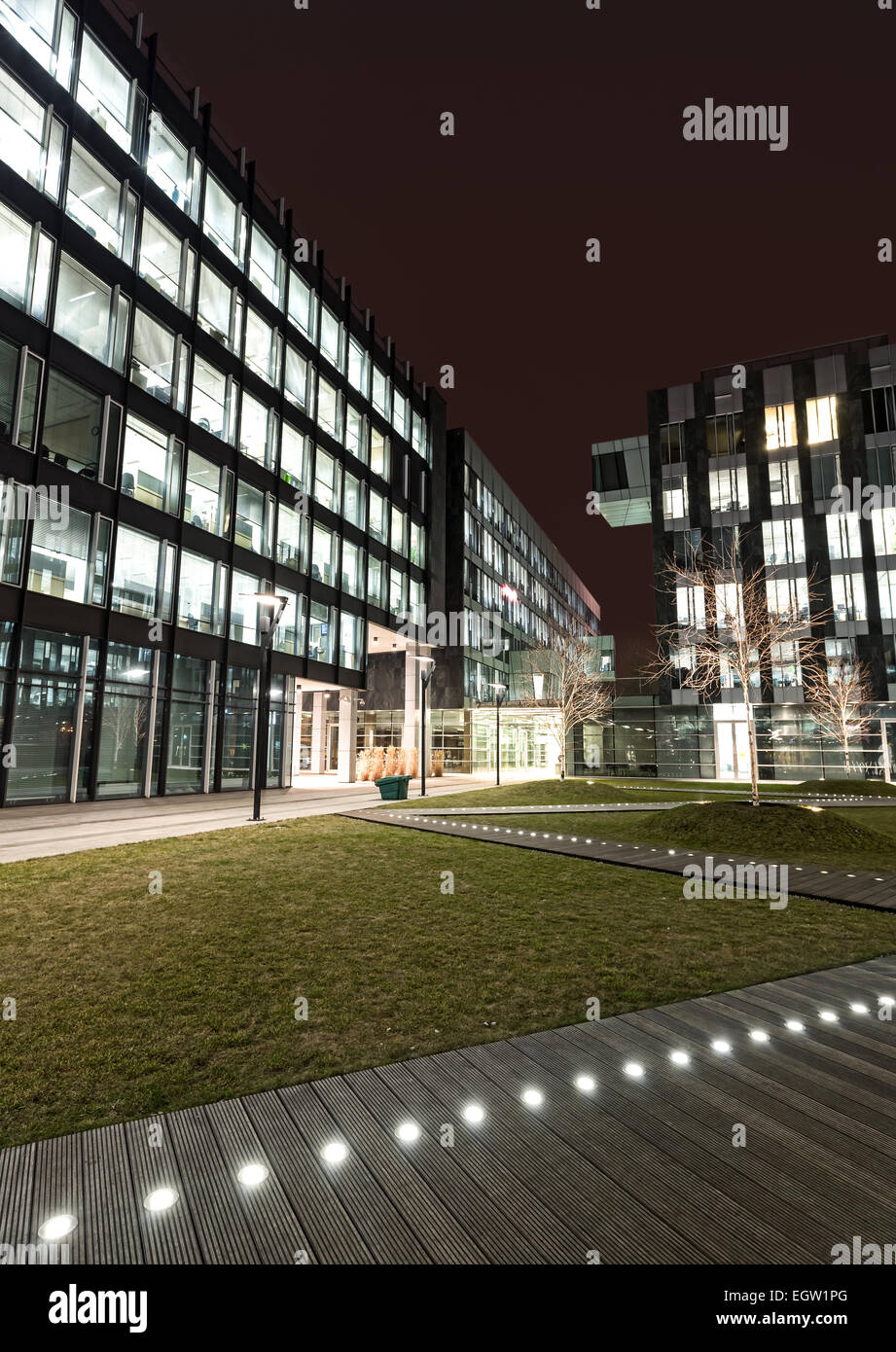 Modern business center in Warsaw at night Stock Photo - Alamy