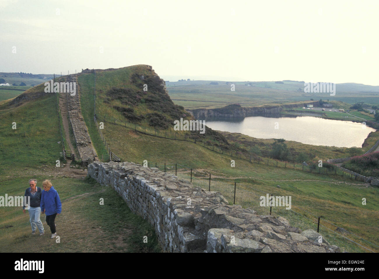 Walkers above Cawfields Quarry by Hadrian's Wall Northumberland England ...