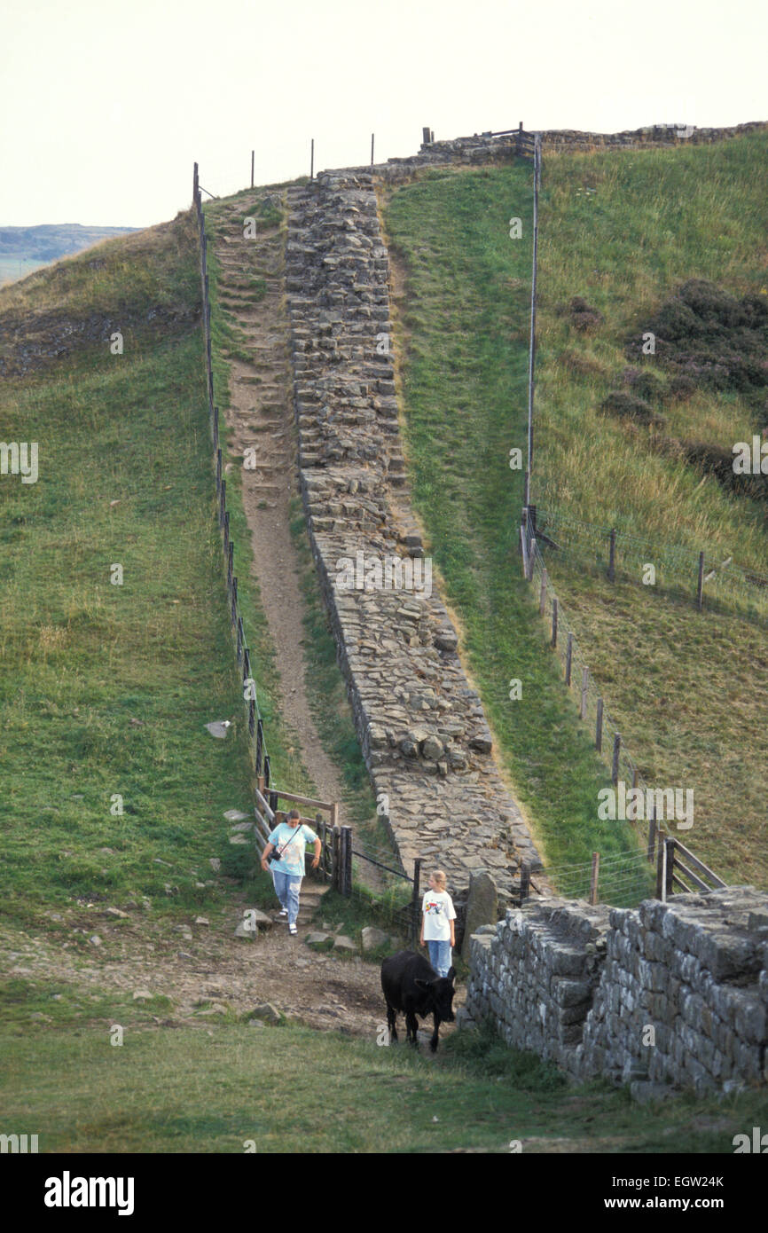 Walkers above Cawfields Quarry by Hadrian's Wall Northumberland England ...