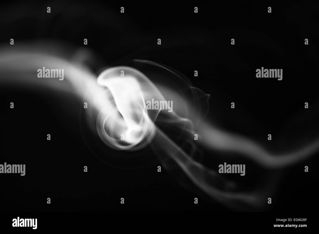 Studio shot of some smoke on a black background Stock Photo - Alamy