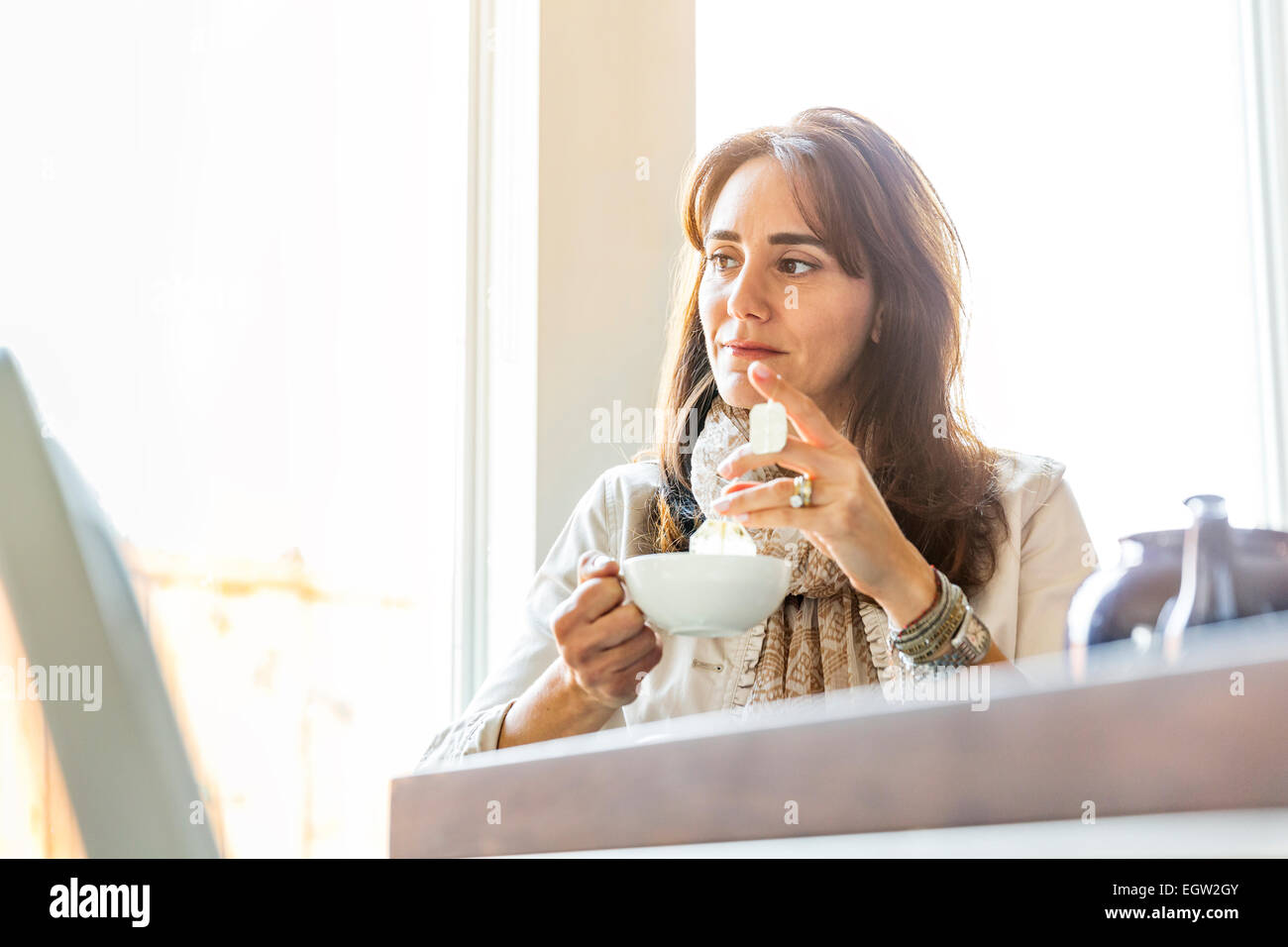 Beautiful woman sitting tea table hi-res stock photography and images ...