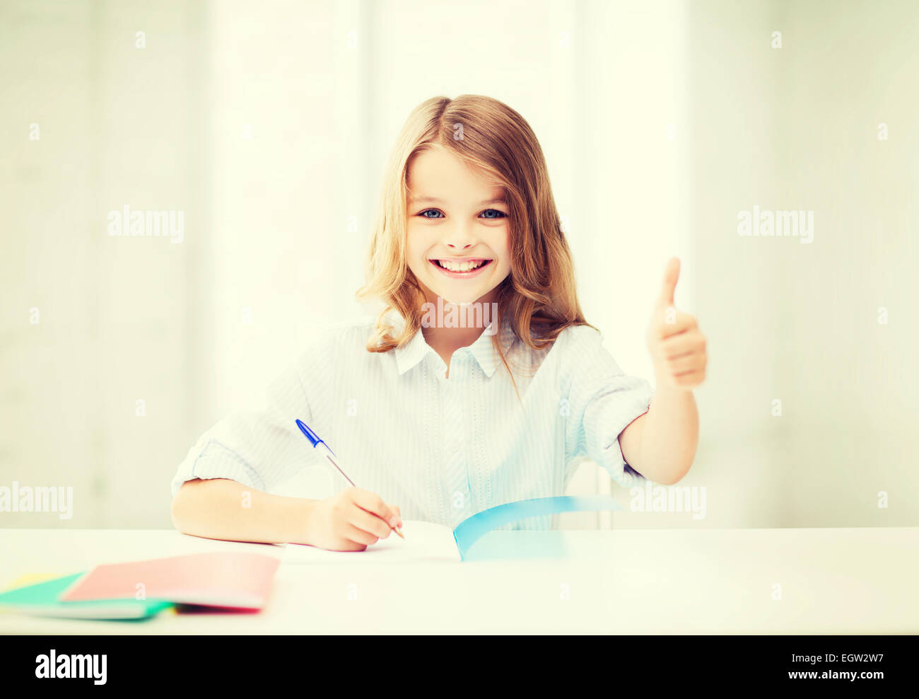 student girl studying at school Stock Photo - Alamy