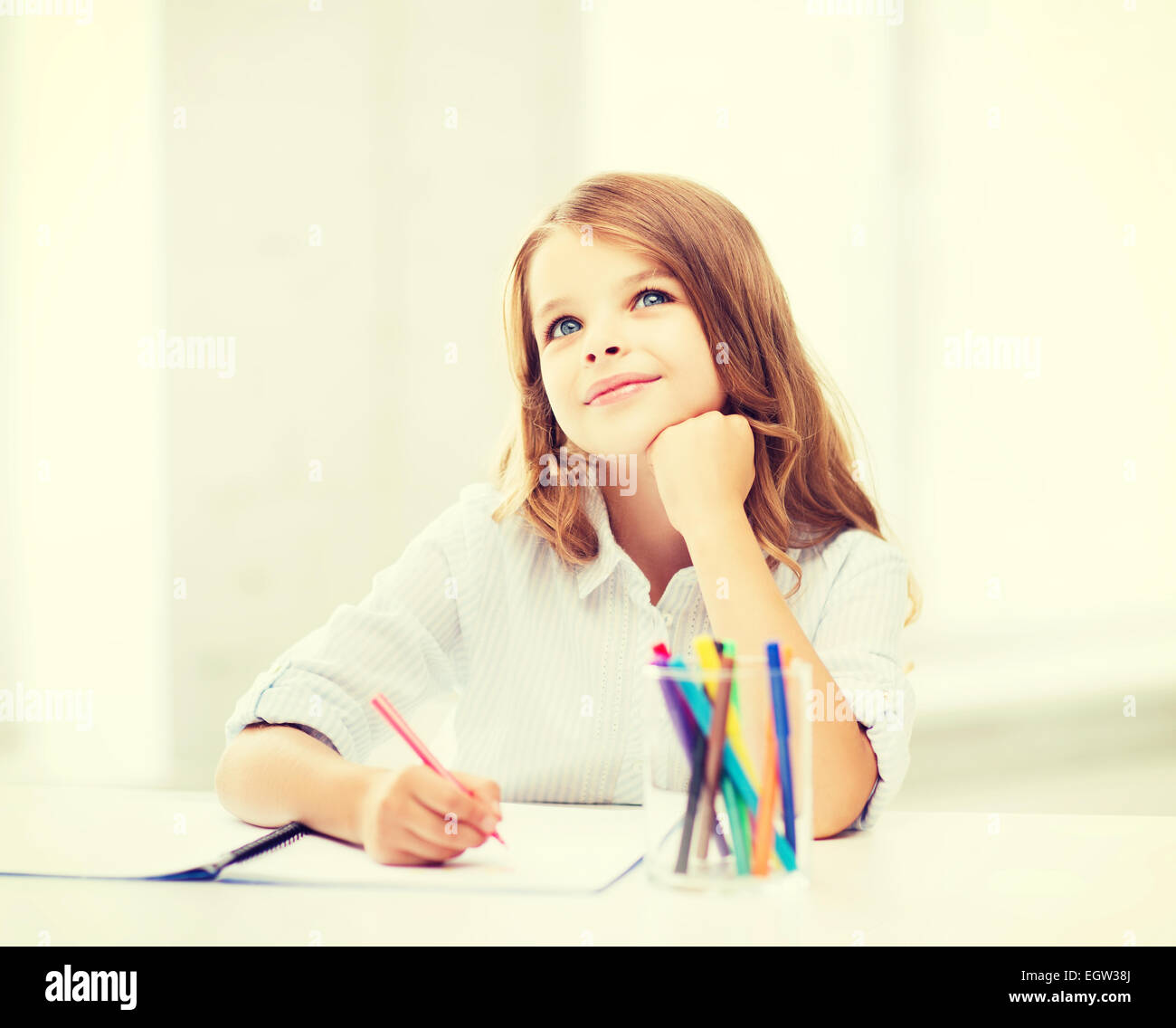 little student girl drawing at school Stock Photo - Alamy