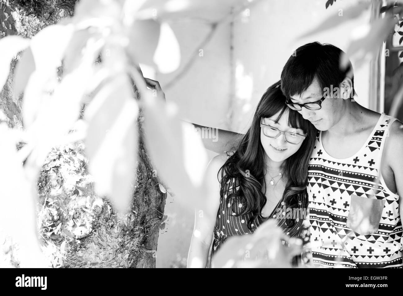 Couple standing in the dark Black and White Stock Photos & Images - Alamy