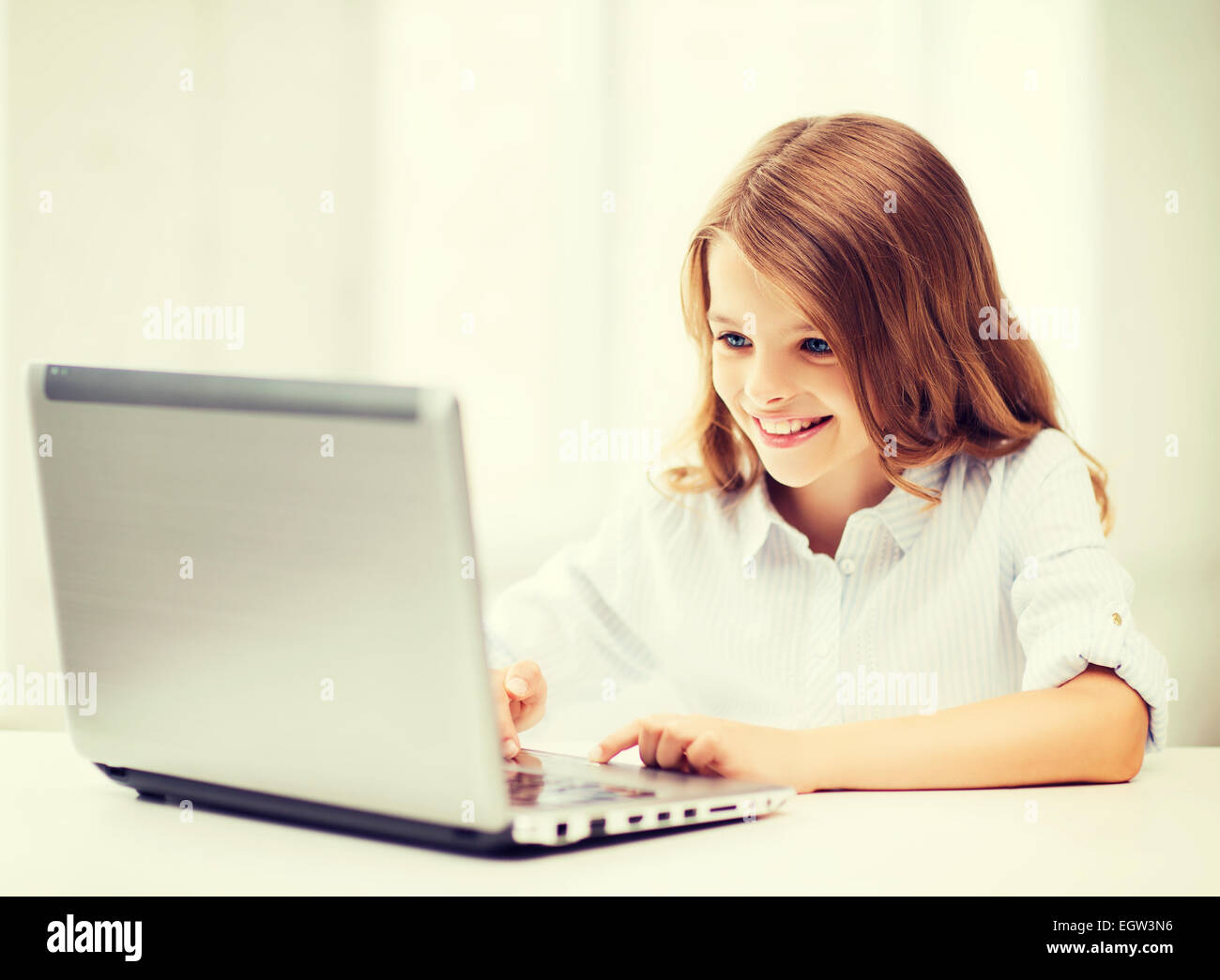 girl with laptop pc at school Stock Photo - Alamy