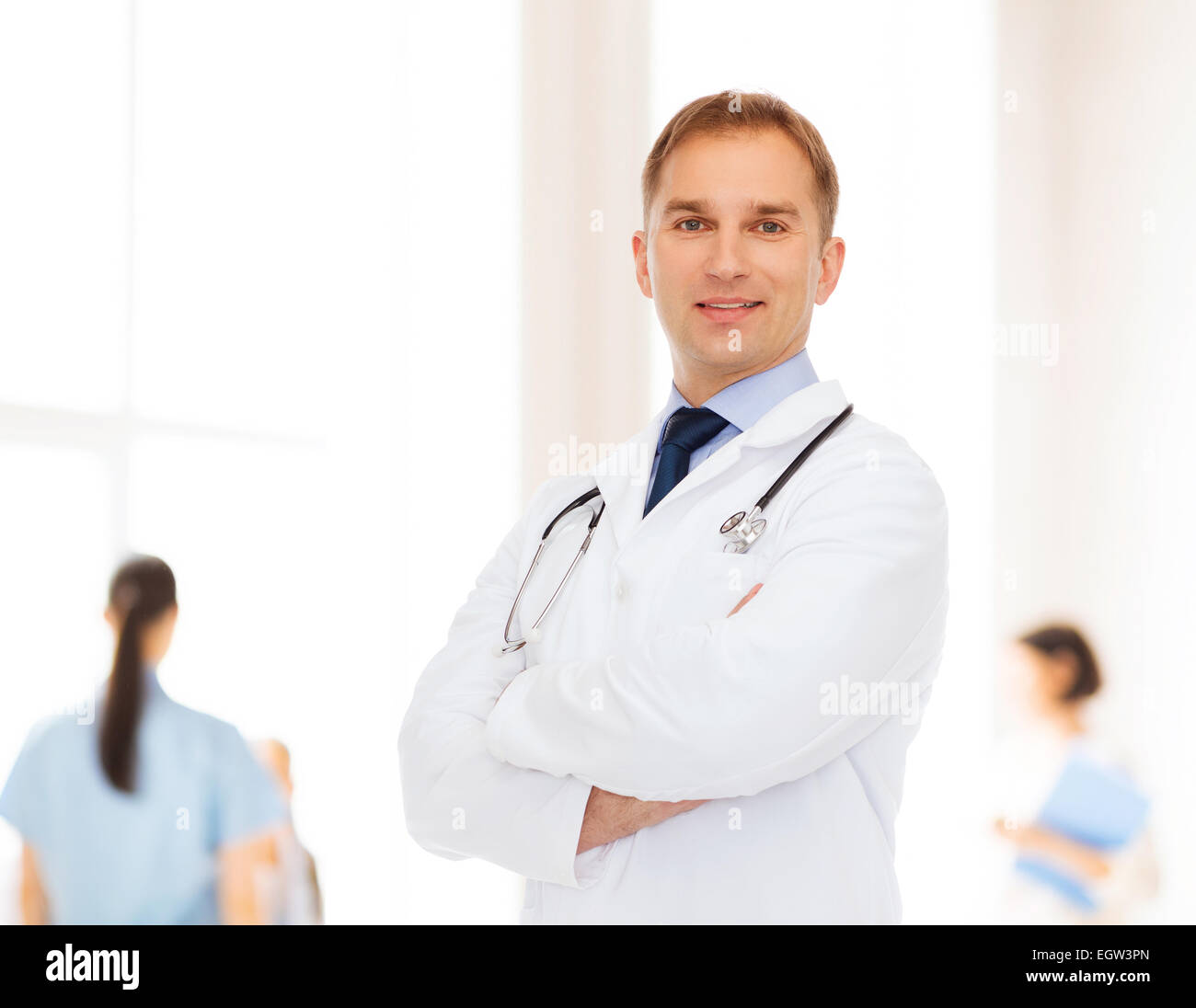 smiling male doctor with stethoscope Stock Photo - Alamy