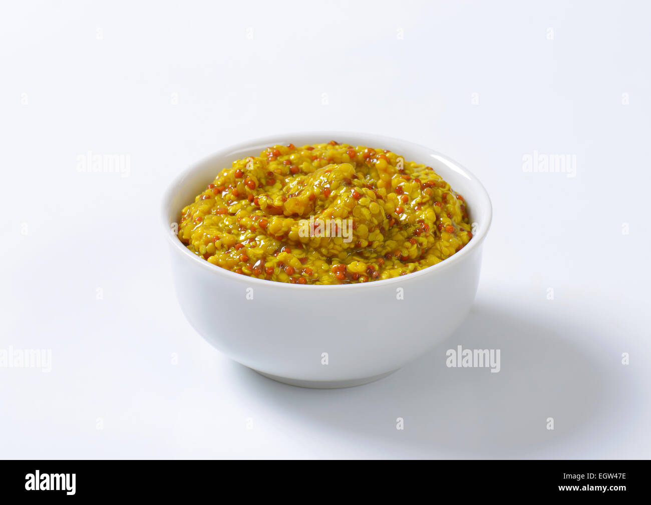 Bowl of coarse grain mustard Stock Photo - Alamy