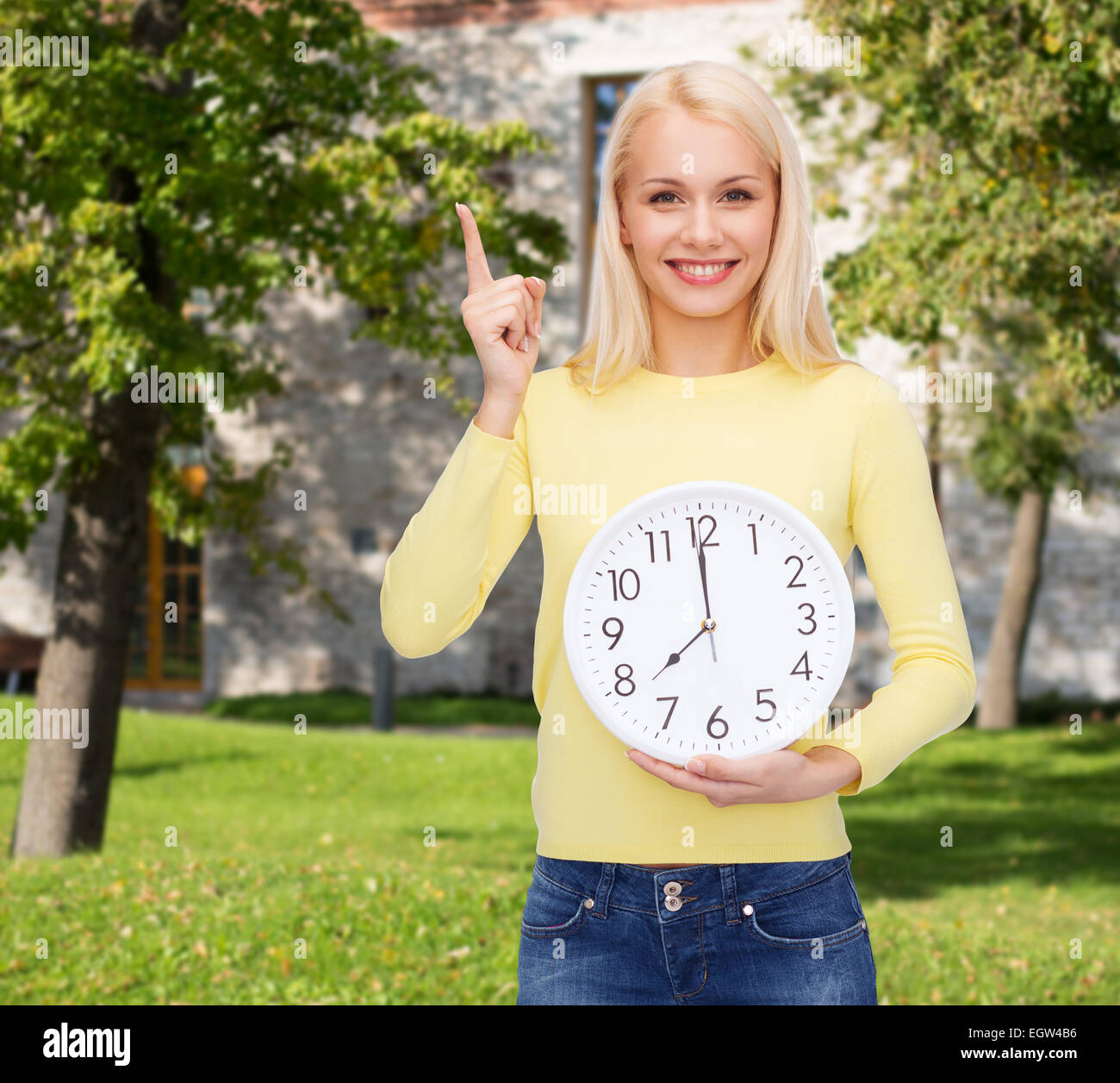 Office smile clock hi-res stock photography and images - Alamy