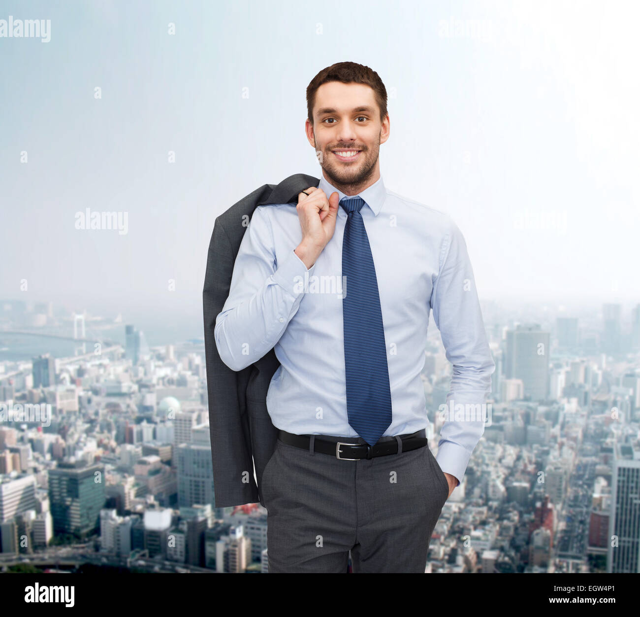 smiling young and handsome businessman Stock Photo - Alamy