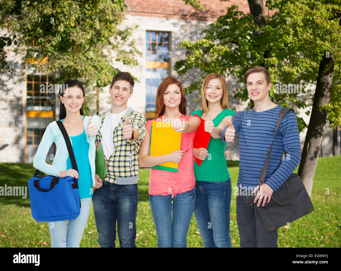 group of smiling students standing Stock Photo - Alamy