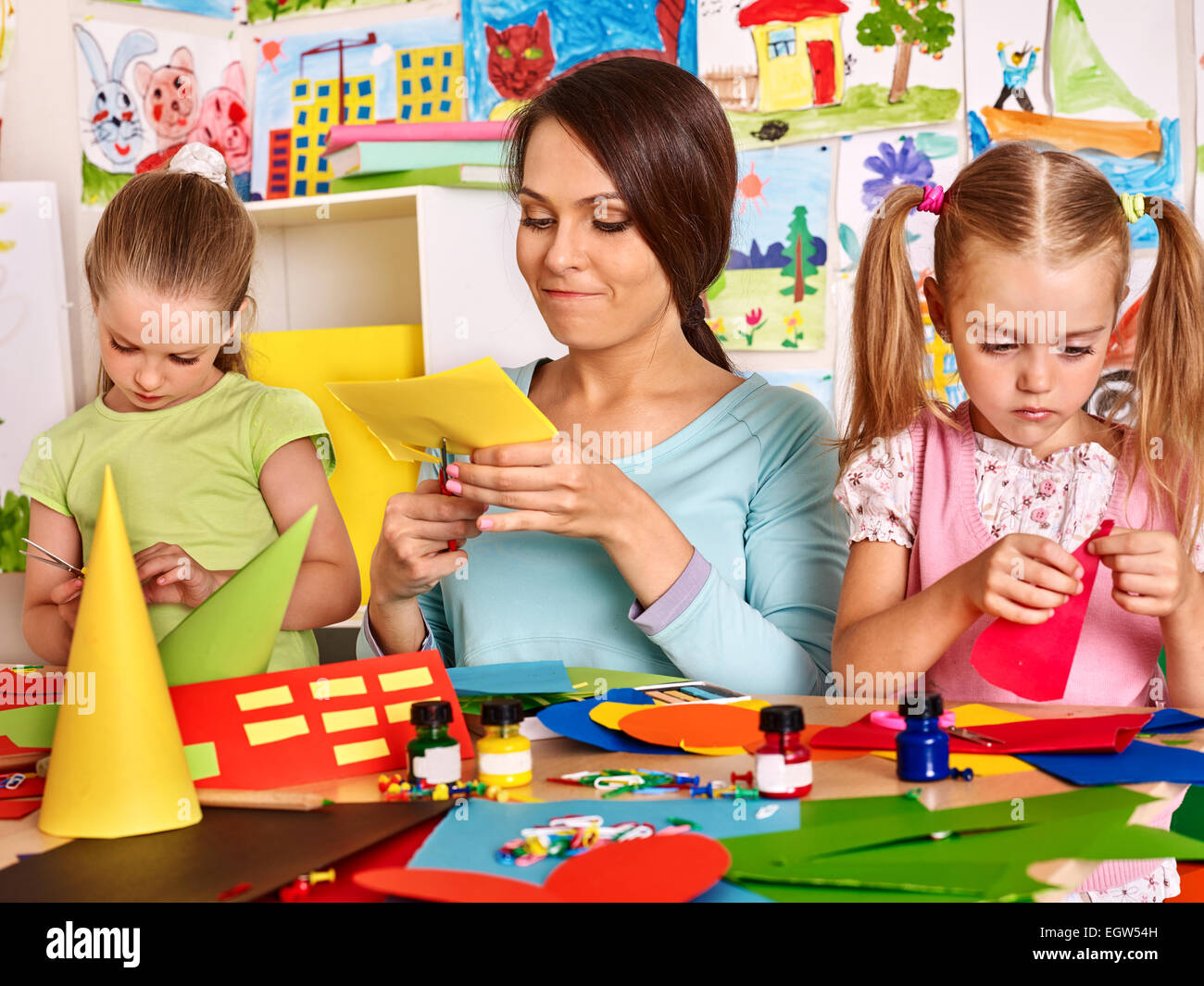 Child cutting out scissors paper Stock Photo - Alamy