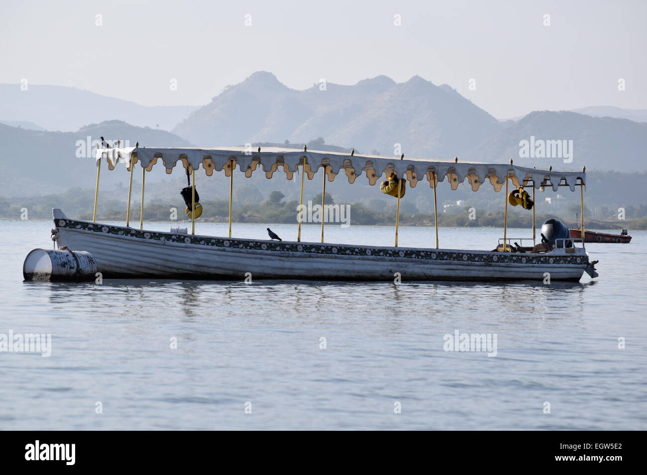 Boat with mountains hi-res stock photography and images - Alamy