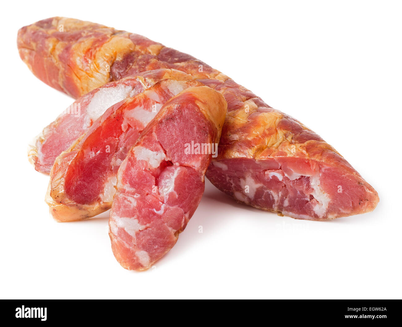 Sliced dry cured sausage isolated on white background Stock Photo - Alamy
