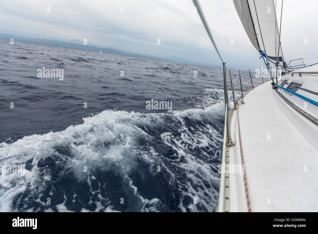 Stormy sea and sail boat hi-res stock photography and images - Alamy