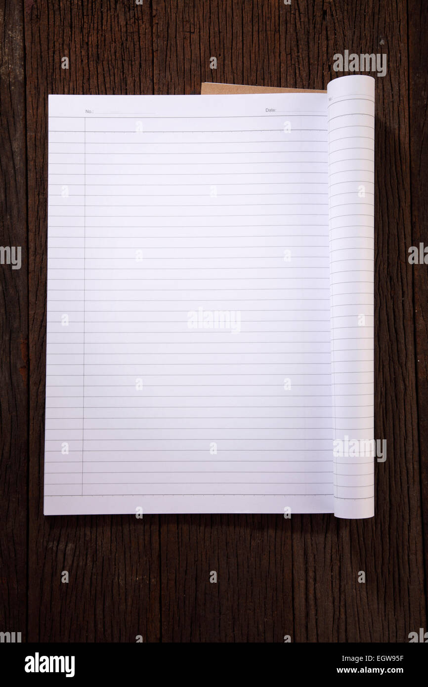 blank exercise book on the wooden table Stock Photo - Alamy