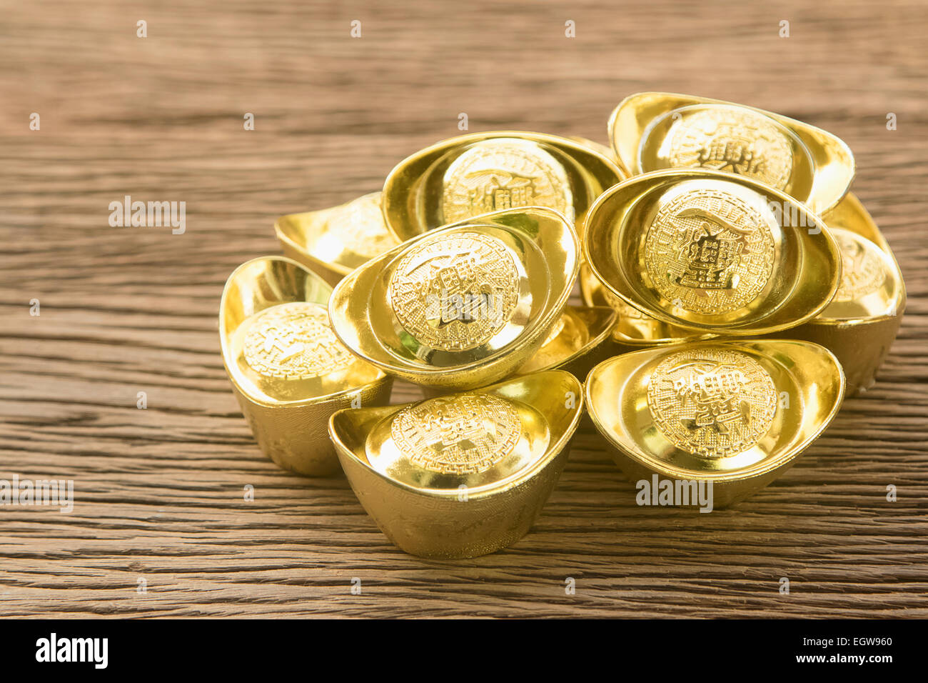 Chinese new year ornament--Stack of chinese gold ingots Stock Photo - Alamy