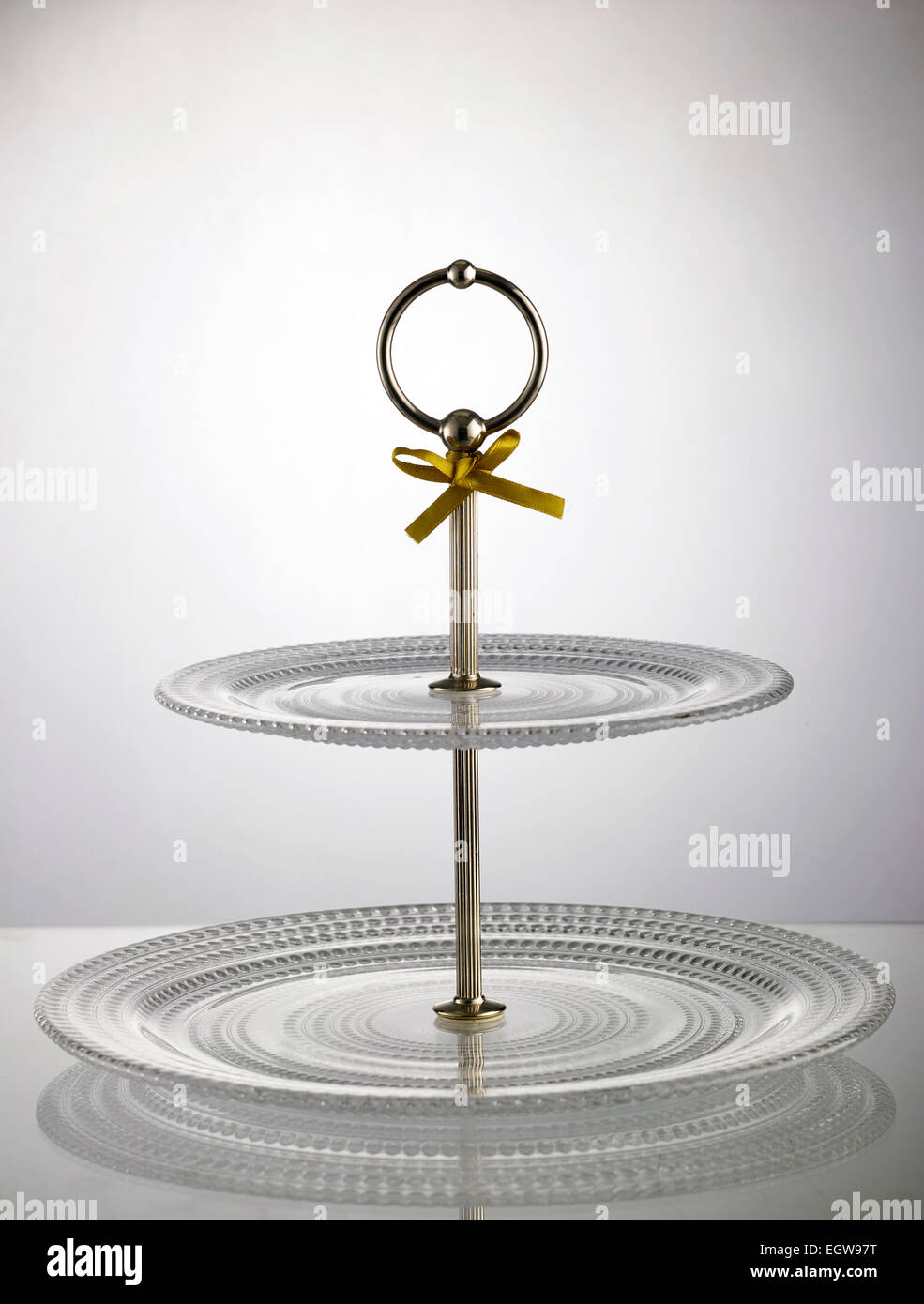 two tier plate on the with little ribbon Stock Photo - Alamy