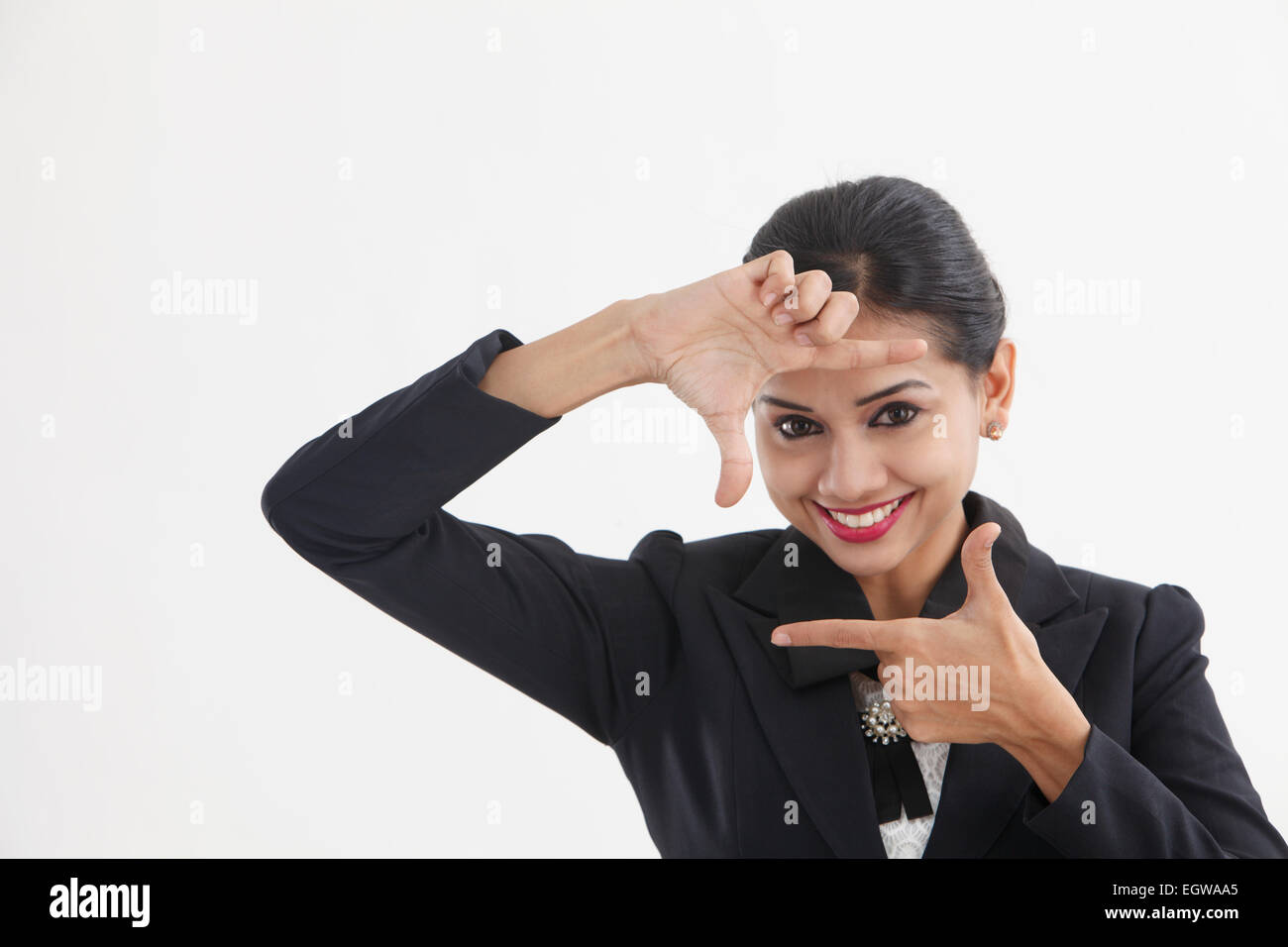 picture of lovely woman creating a frame with fingers Stock Photo - Alamy