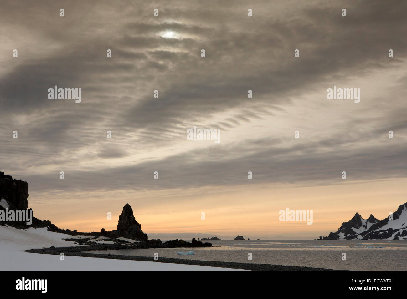 Antarctica, Half Moon Is, dramatic dawn sky over Livingston Island ...
