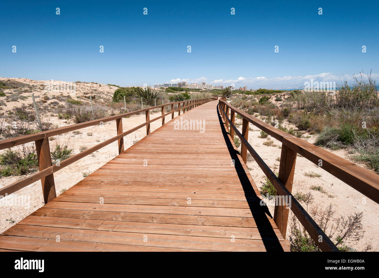 Wooden walkway over dunes. Photo taken in Carabassi beach, Elche, Spain ...