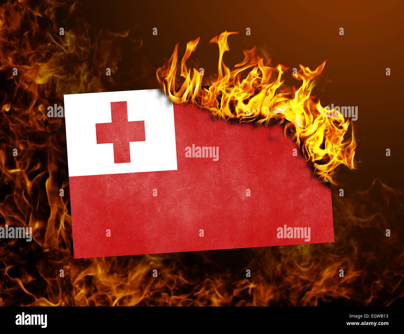 Flag burning - concept of war or crisis - Tonga Stock Photo - Alamy