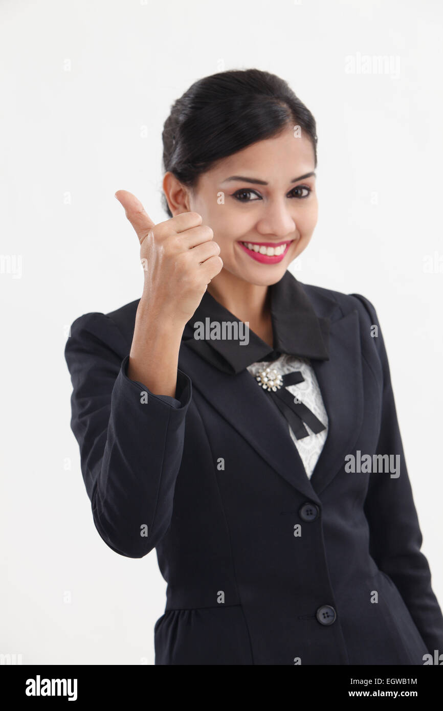 formal Asian Business woman with thumbs up Stock Photo - Alamy