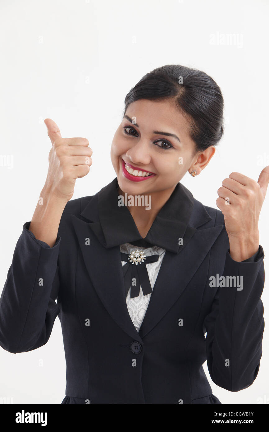 formal Asian Business woman with thumbs up Stock Photo - Alamy