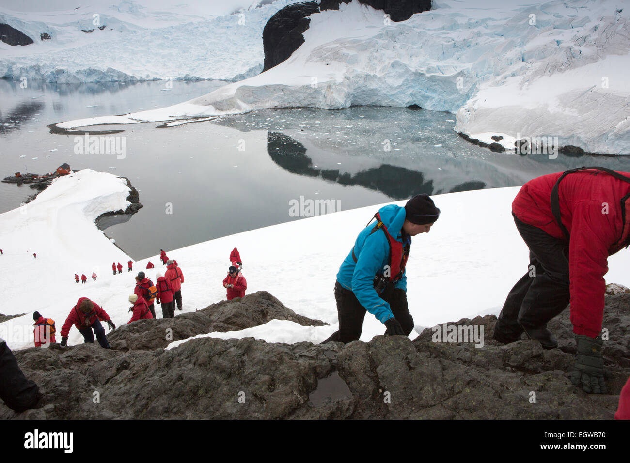 Antarctica, Graham Land, Paradise Bay, cruise ship passengers climbing ... Antarctica, Graham Land, Paradise Bay, cruise ship passengers climbing ...