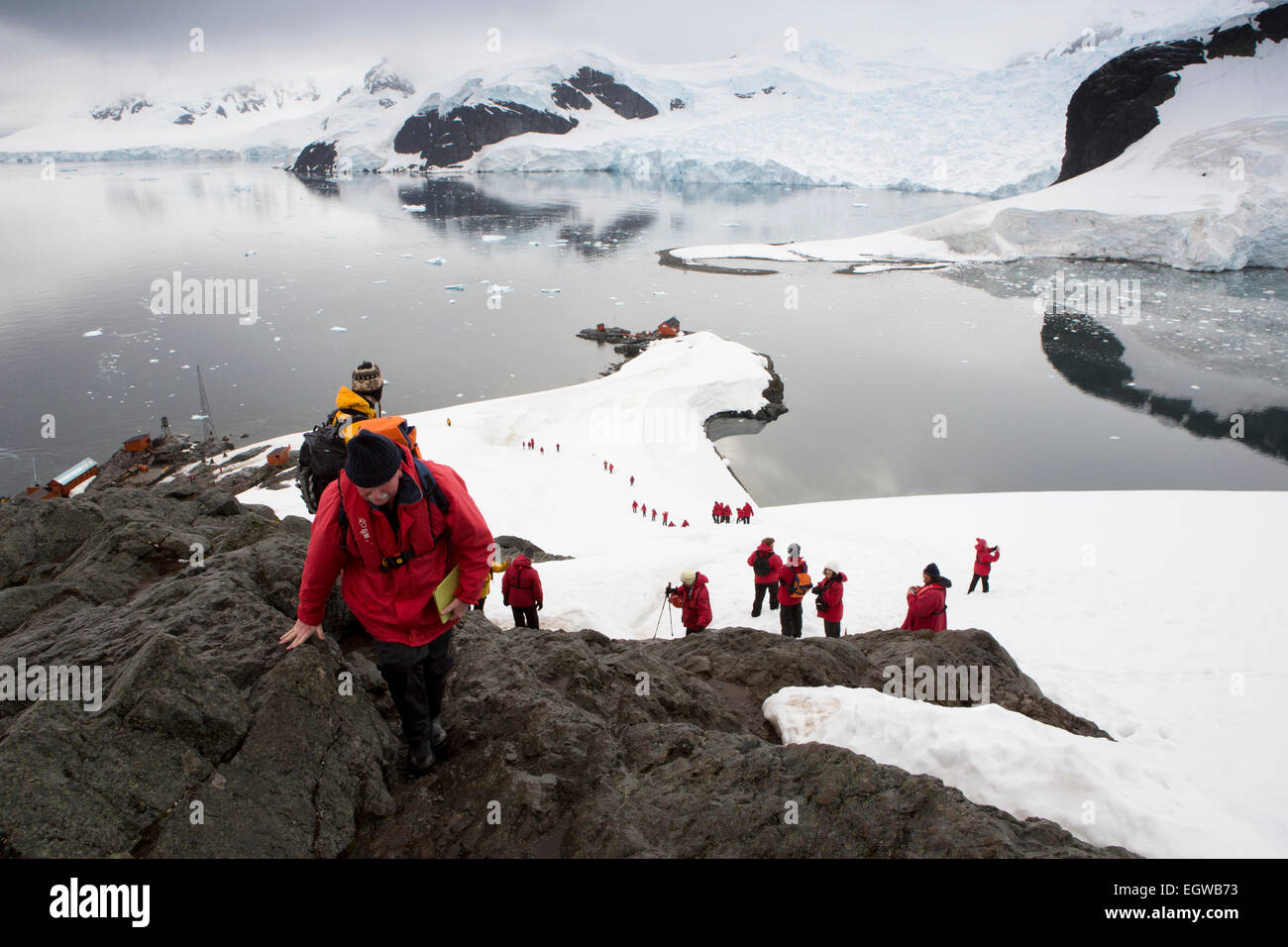 Antarctica, Graham Land, Paradise Bay, cruise ship passengers climbing ... Antarctica, Graham Land, Paradise Bay, cruise ship passengers climbing ...