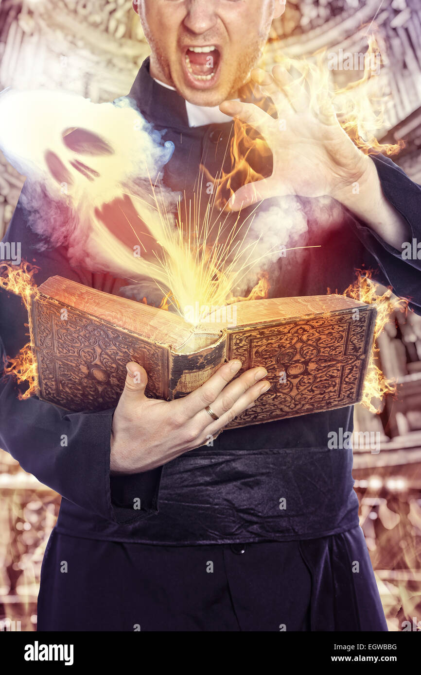 The priest celebrates the exorcism Stock Photo - Alamy