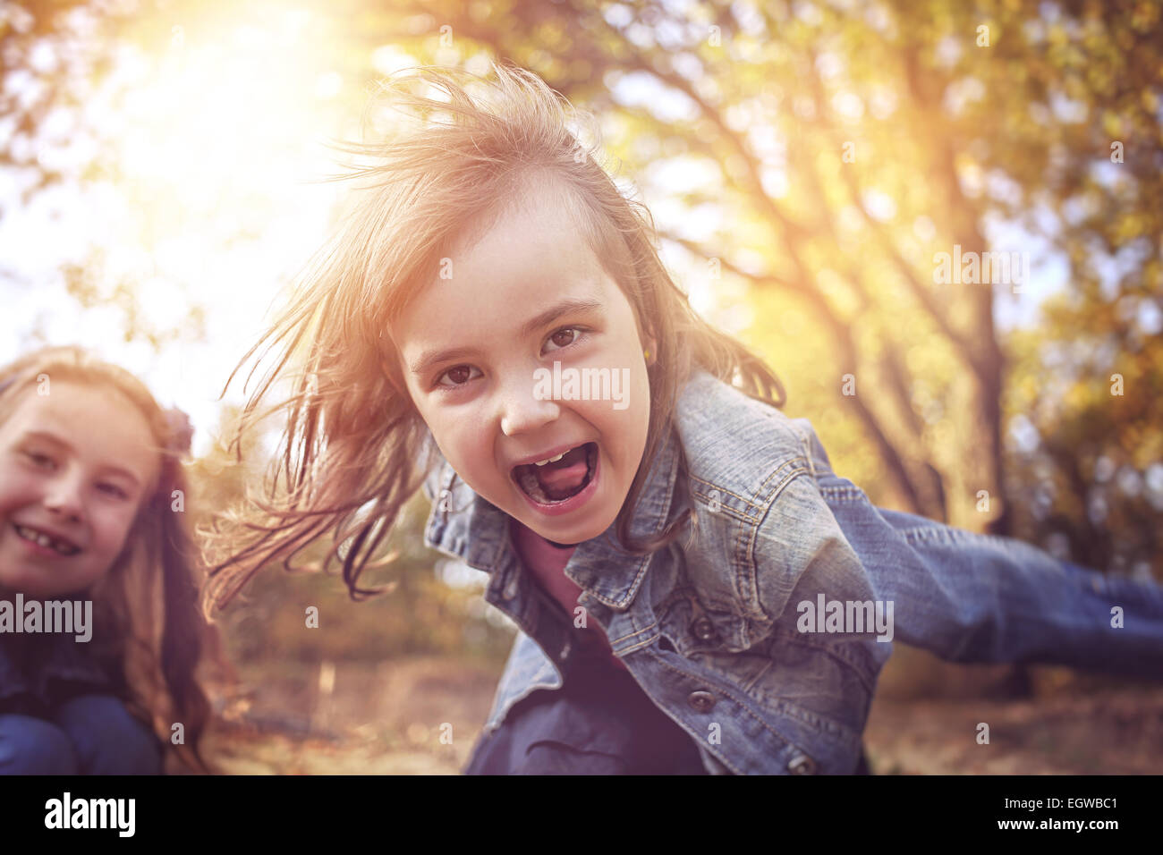 Joyful laughing young friends Stock Photo - Alamy