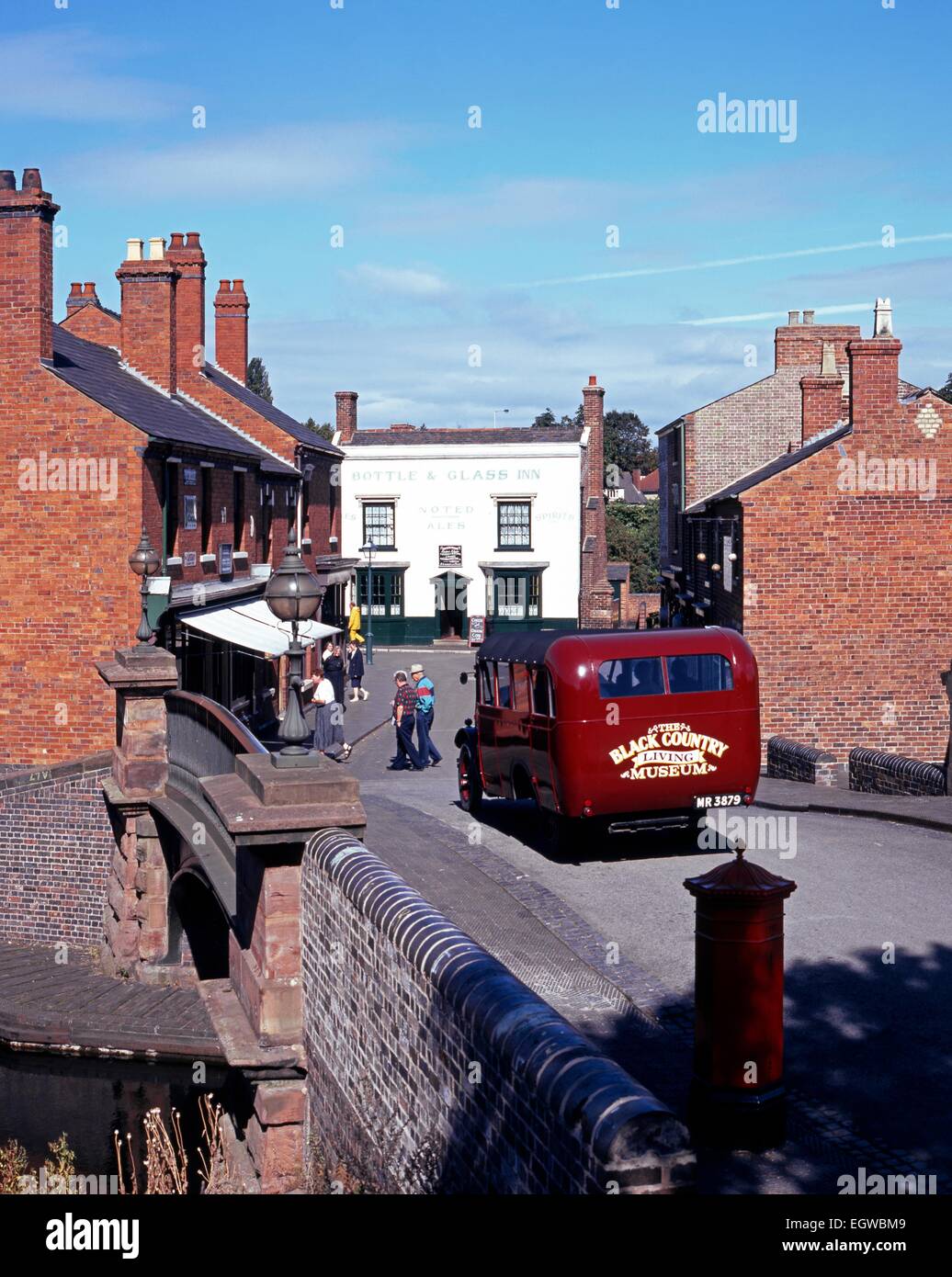Vintage REO Speedwagon bus along the main Victorian village street at ...