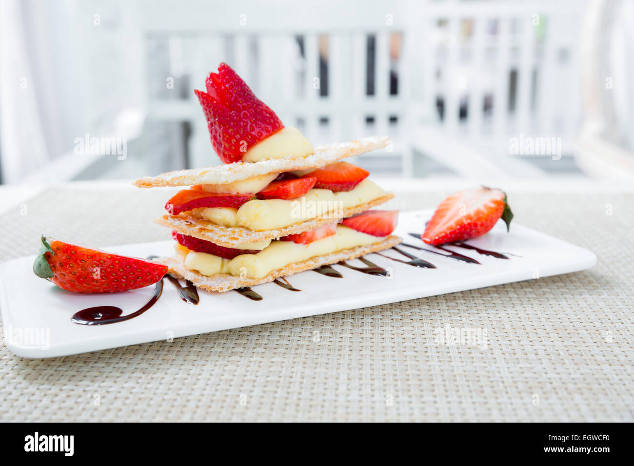 Strawberry Mille Feuille cake in white plate Stock Photo - Alamy
