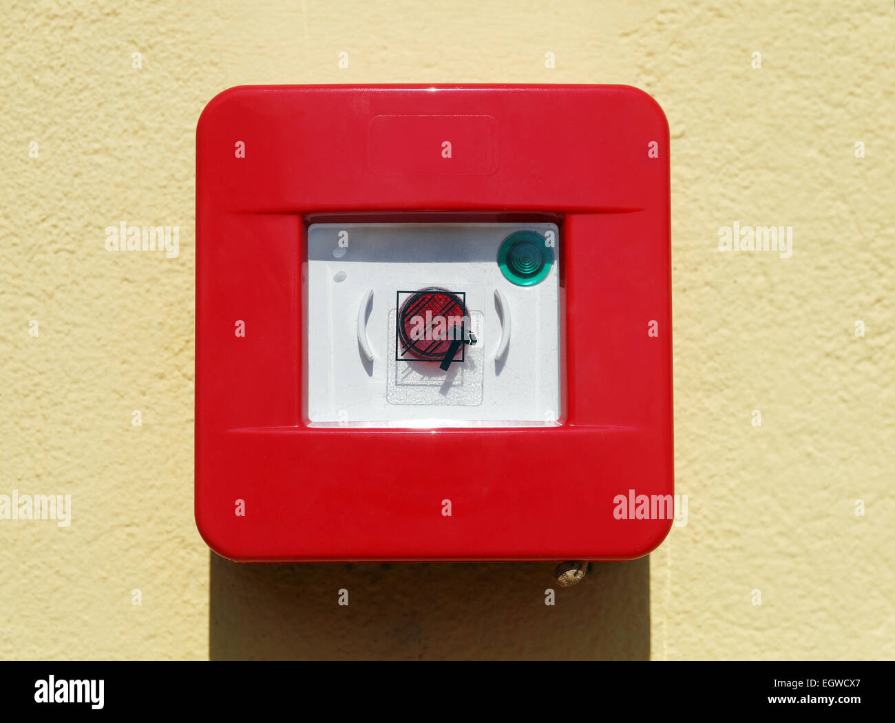 red fire alarm box on the wall Stock Photo - Alamy