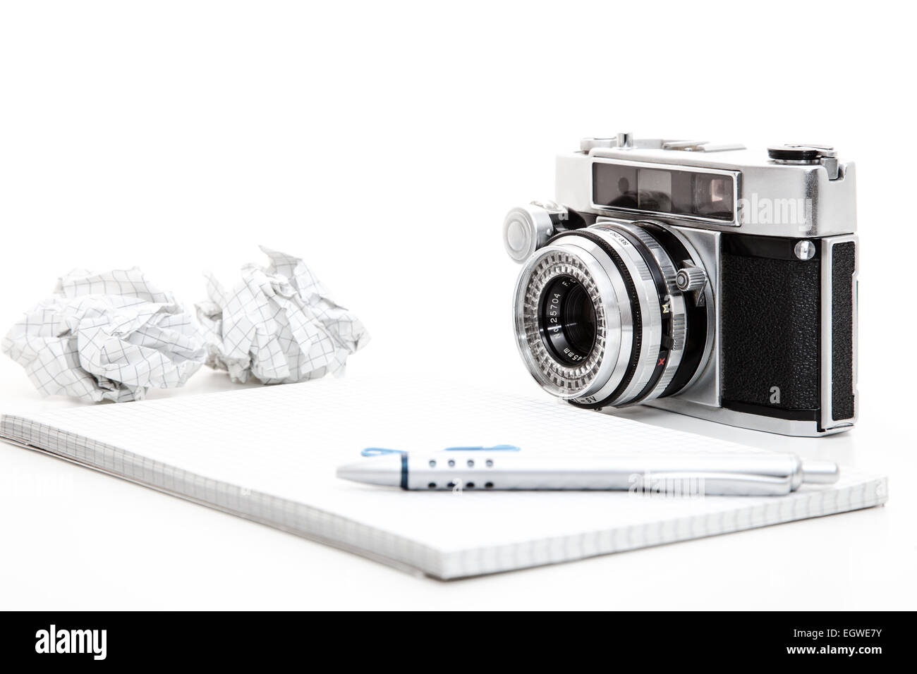 Notepad, pen and retro camera. All on white background Stock Photo - Alamy