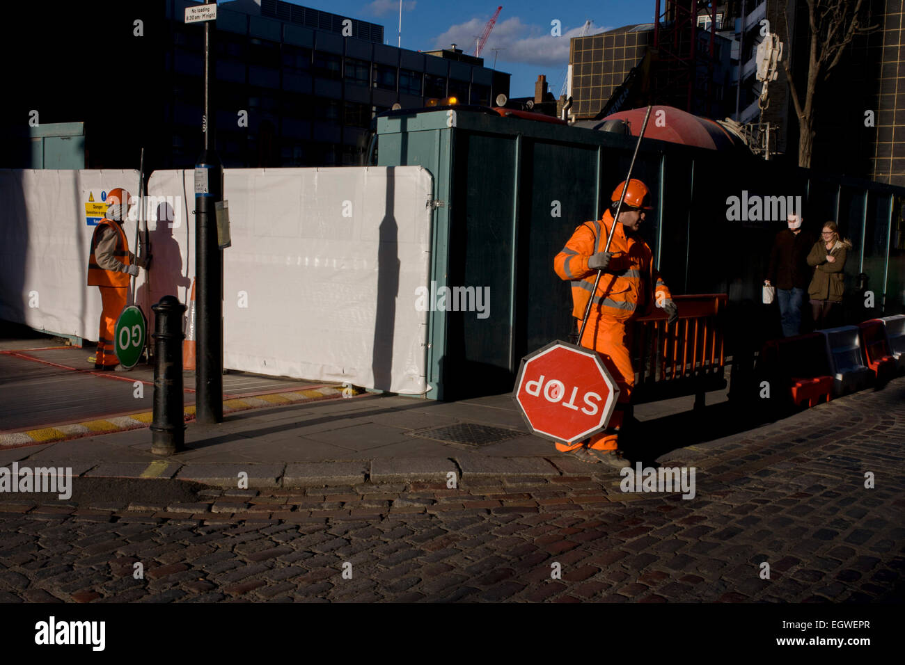 Construction site Banksman (Traffic Marshal) waits to control local ...