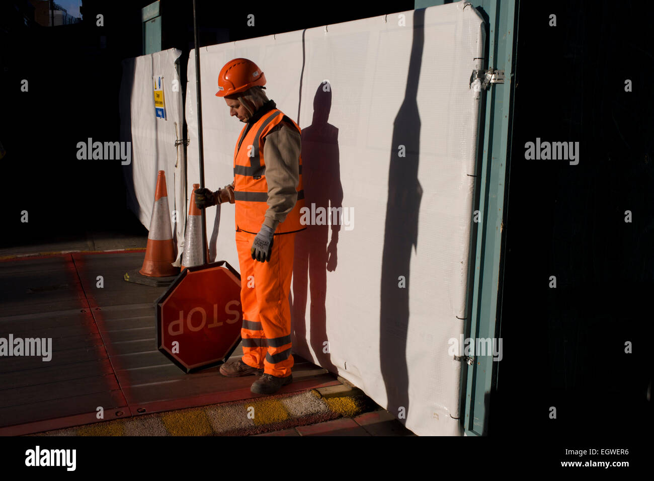 Construction site banksman waits control hi-res stock photography and ...
