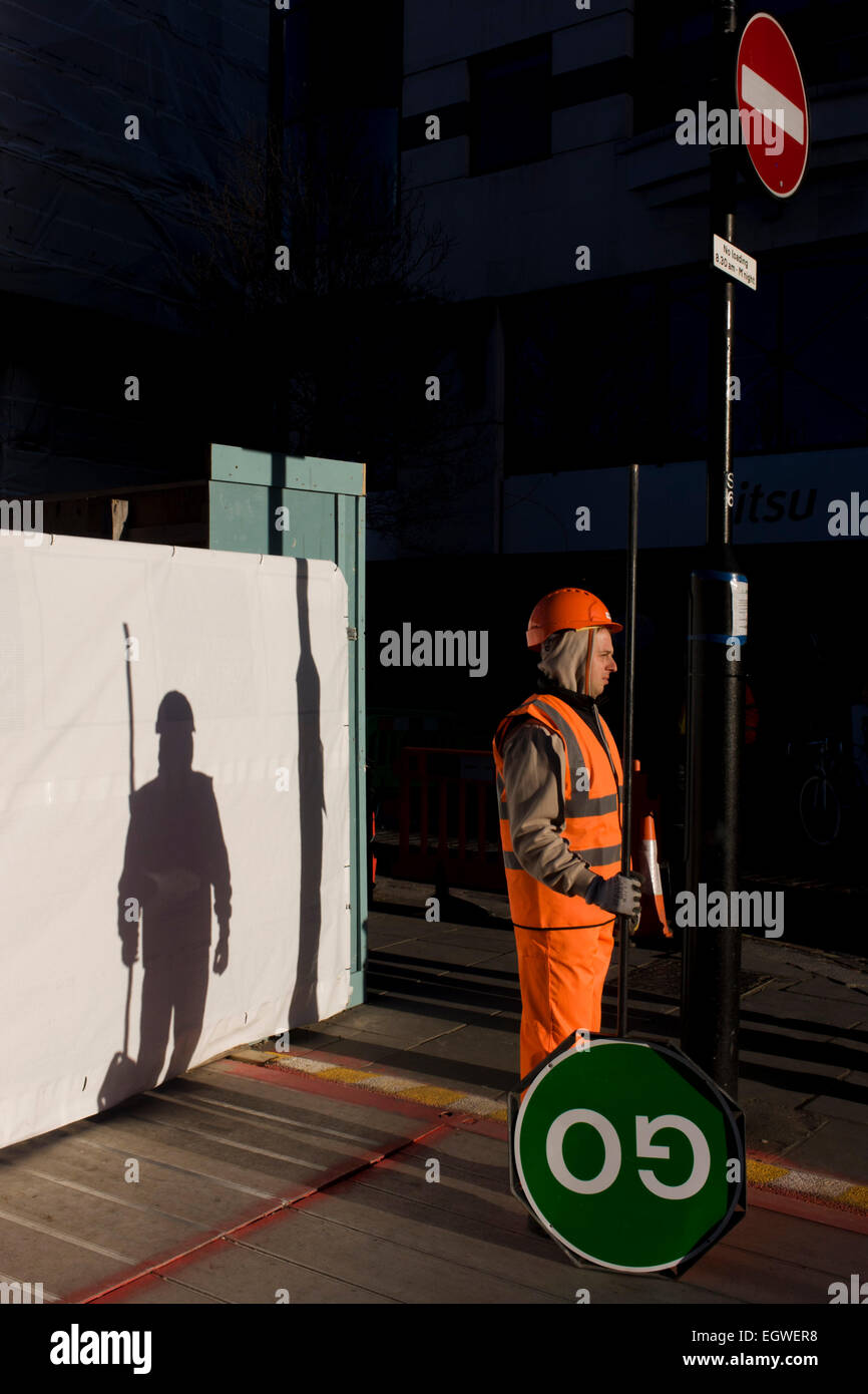 Construction site Banksman (Traffic Marshal) waits to control local ...