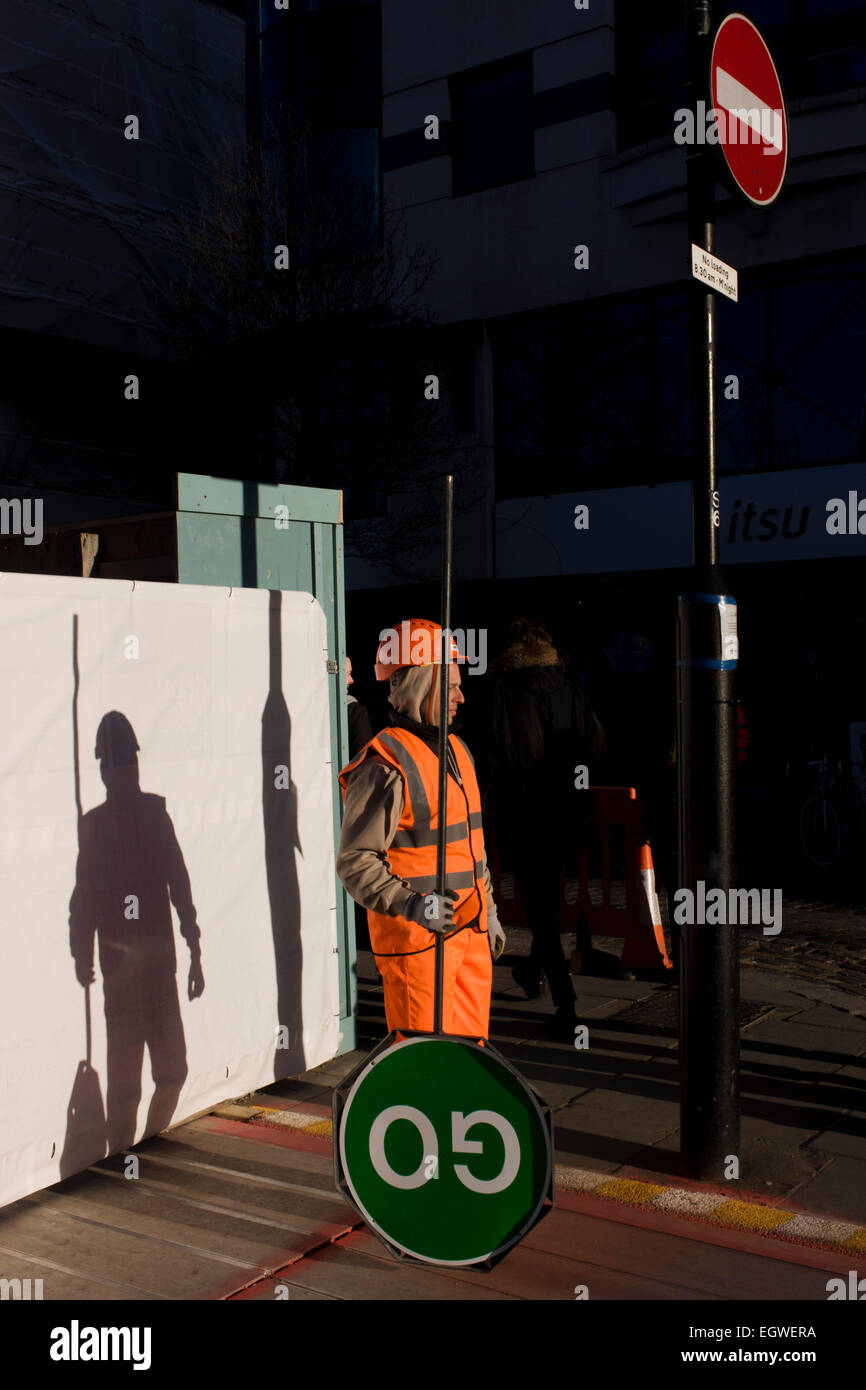 Construction site Banksman (Traffic Marshal) waits to control local ...