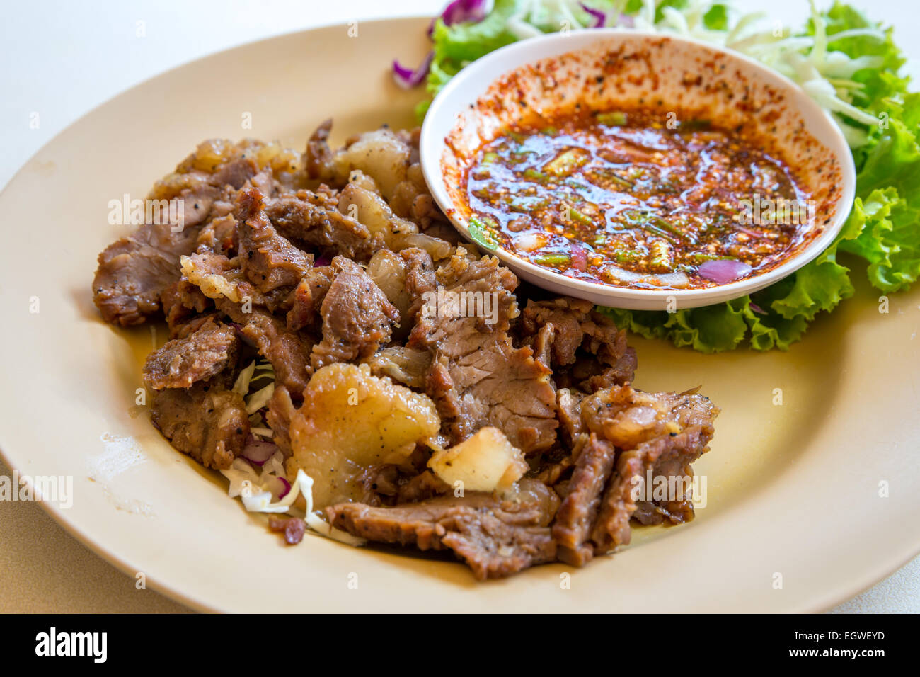 Thai style grilled beef steak serve with fresh vegetable Stock Photo - Alamy