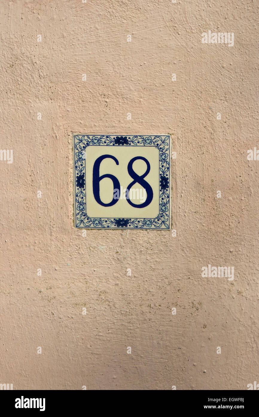 House number 68 on a plastered wall Stock Photo - Alamy