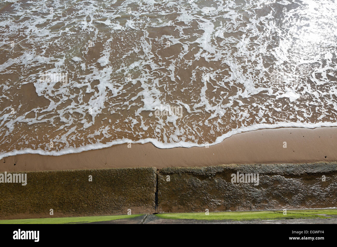 The tide turns on the beach in the winter sunshine, Ramsgate, Kent ...