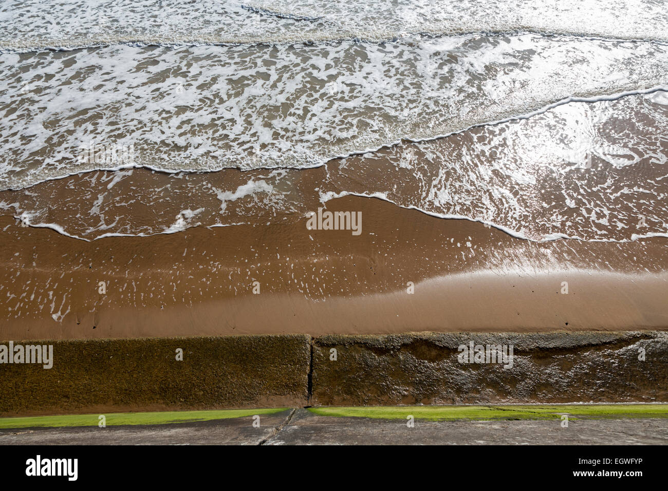 The tide turns on the beach in the winter sunshine, Ramsgate, Kent ...