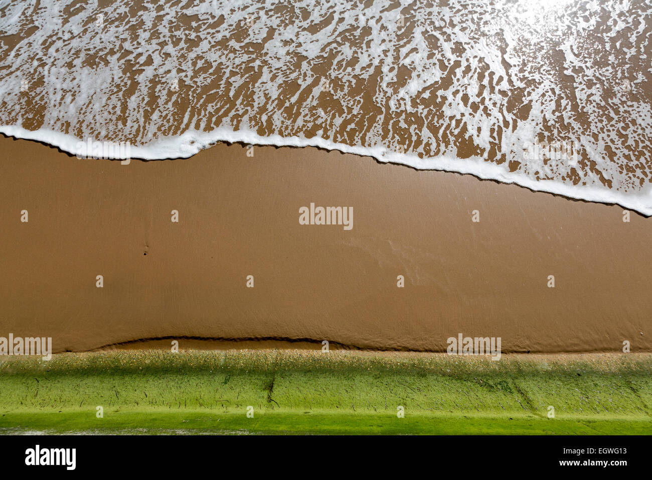 The tide turns on the beach in the winter sunshine, Ramsgate, Kent ...